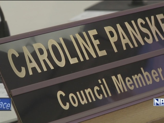 Oshkosh City Council Member Sits During